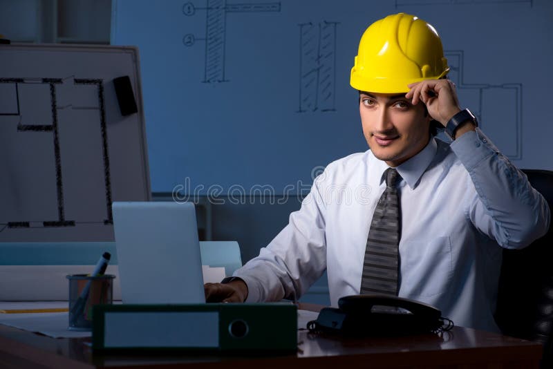 The Young Construction Architect Working on Project at Night Stock ...