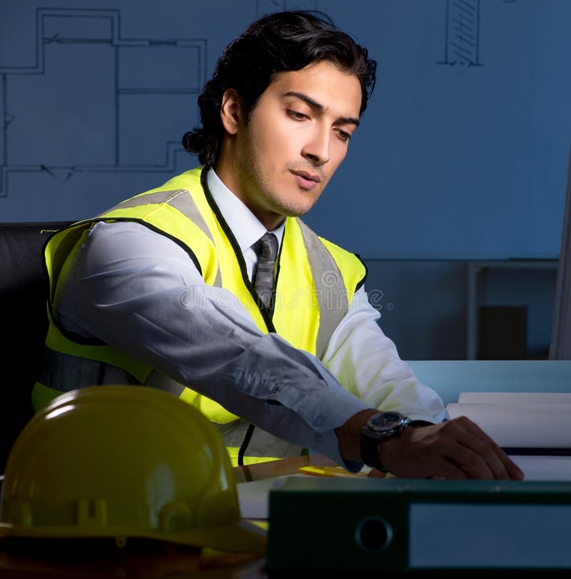 Young Construction Architect Working on Project at Night Stock Image ...