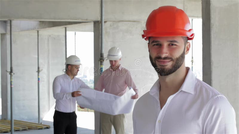 Construction Engineer Poses at the Building Under Construction Stock ...