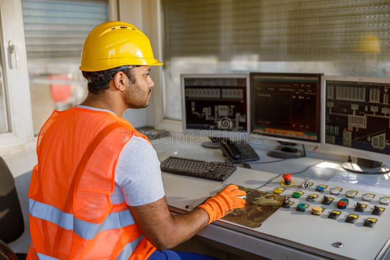 Young Multiethnic Operator Working at Concrete Plant Stock Photo ...