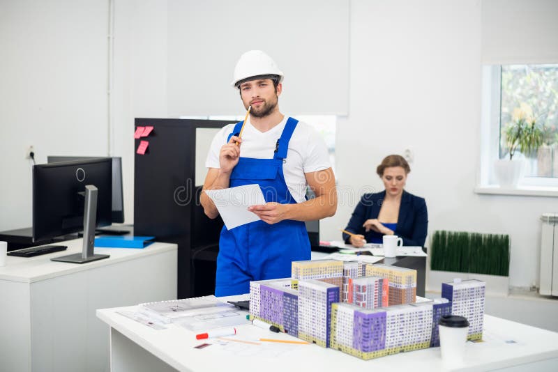 Young Construction Supervisor Taking Notes in the Office Stock Photo ...