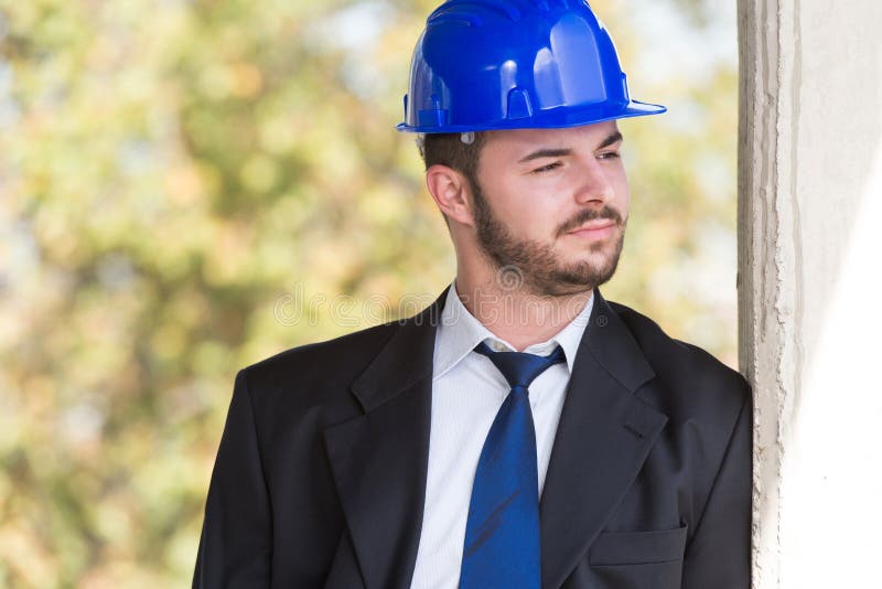 Young Construction Worker in Hard Hat Stock Image - Image of crossed ...