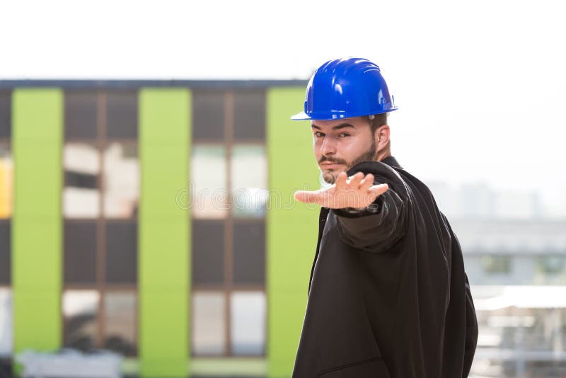Young Construction Worker in Hard Hat Stock Photo - Image of blueprint ...