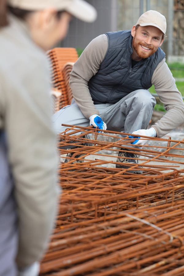Young Construction Worker Laying Foundations Stock Photo - Image of ...