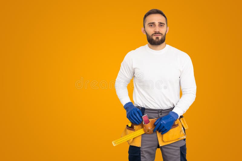 Young Construction Workers on a Colored Background Stock Image - Image ...