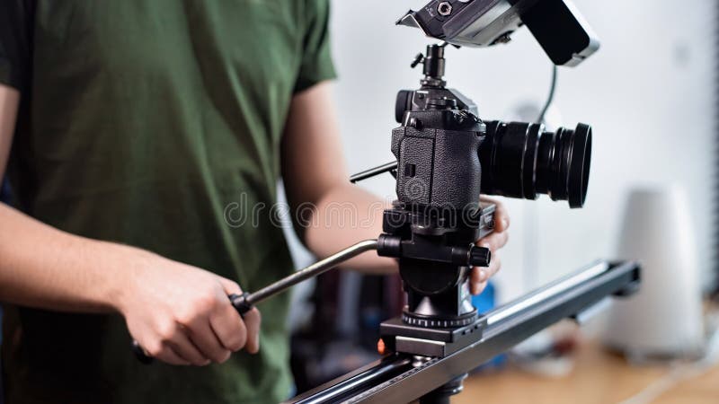 Young Content Creator Man Filming with Camera on Slider Stock Image ...