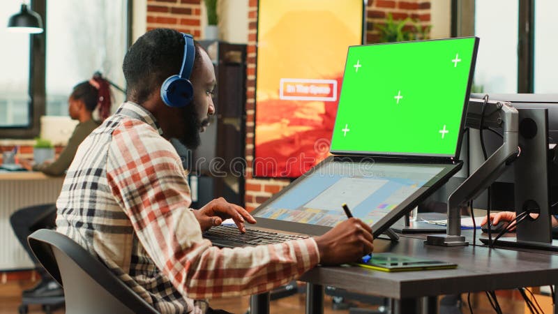 Young Content Creator Using Greenscreen Background on Computer Stock ...