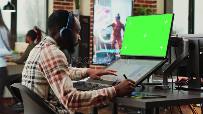 Young Content Creator Using Greenscreen Background on Computer Stock ...