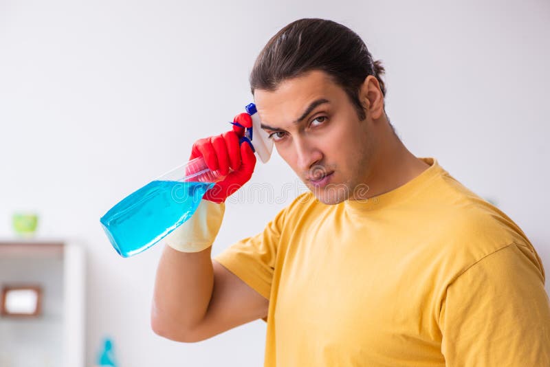 Young Male Contractor Cleaning the House Stock Image - Image of ...