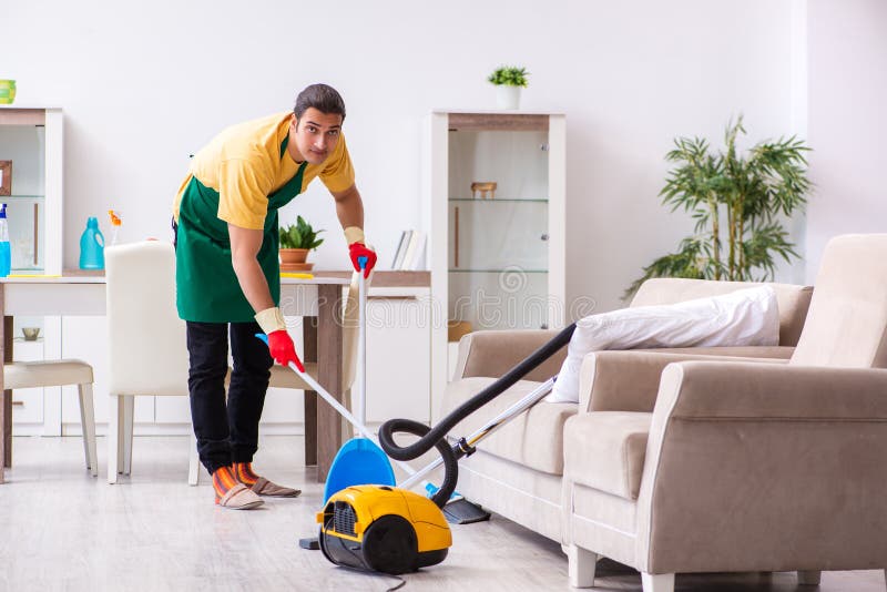 Young Male Contractor Cleaning the House Stock Image - Image of ...