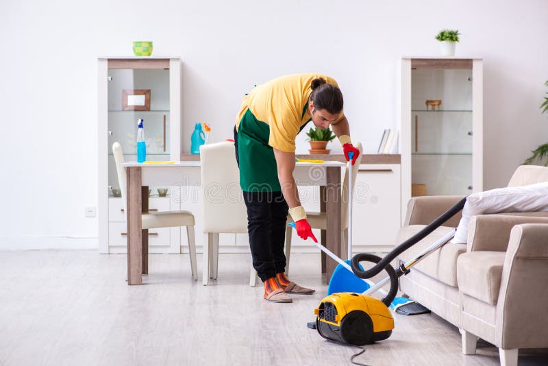 Young Male Contractor Cleaning the House Stock Image - Image of ...