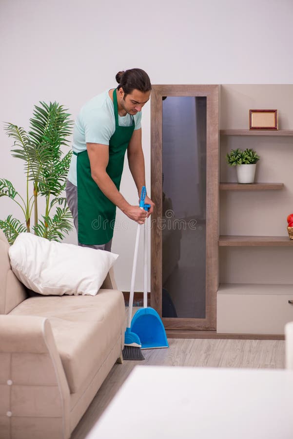 Young Male Contractor Cleaning the House Stock Photo - Image of ...