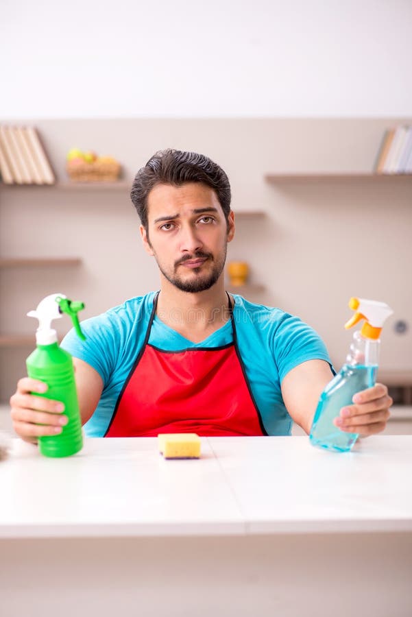 Young Male Contractor Cleaning the House Stock Photo - Image of house ...