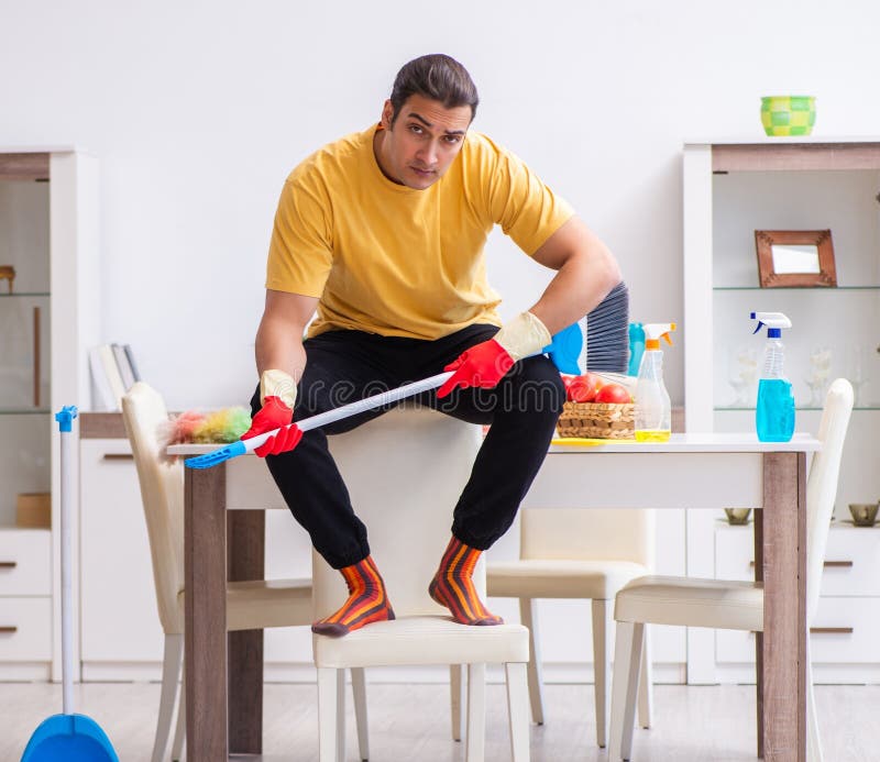 Young Male Contractor Cleaning the House Stock Image - Image of ...