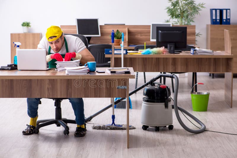 Young Male Contractor Cleaning the Office Stock Image - Image of ...