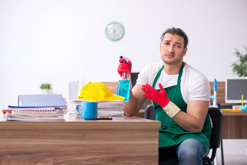Young Male Contractor Cleaning the Office Stock Photo - Image of ...