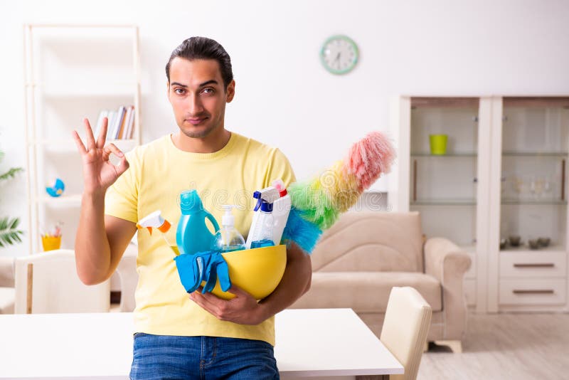 Young Male Contractor Doing Housework at Home Stock Photo - Image of ...