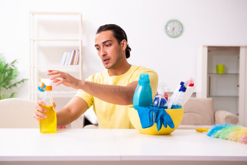 Young Male Contractor Doing Housework at Home Stock Image - Image of ...