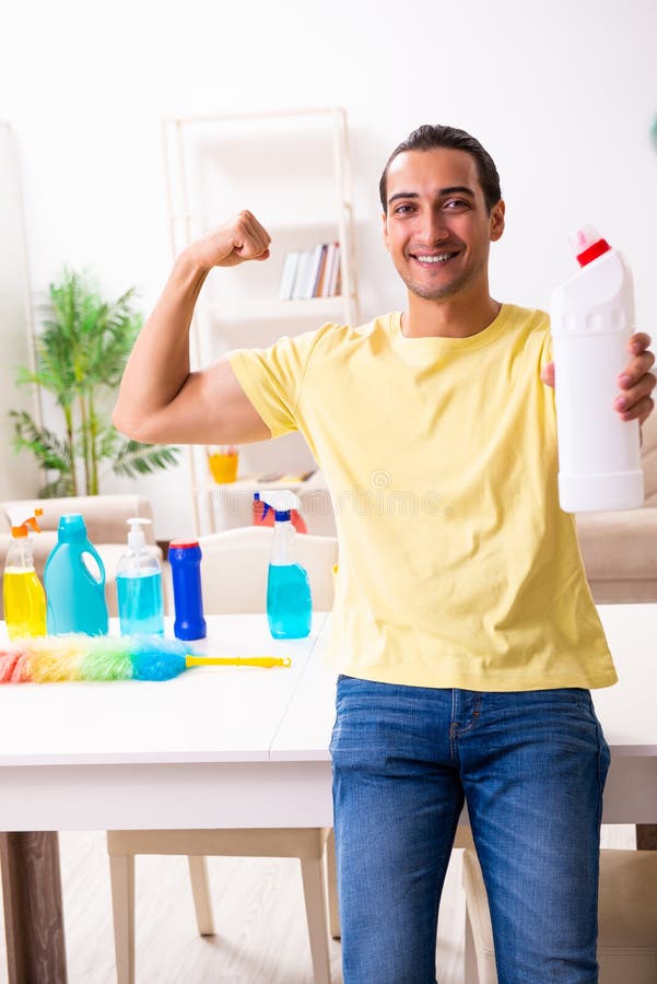 Young Male Contractor Doing Housework at Home Stock Image - Image of ...