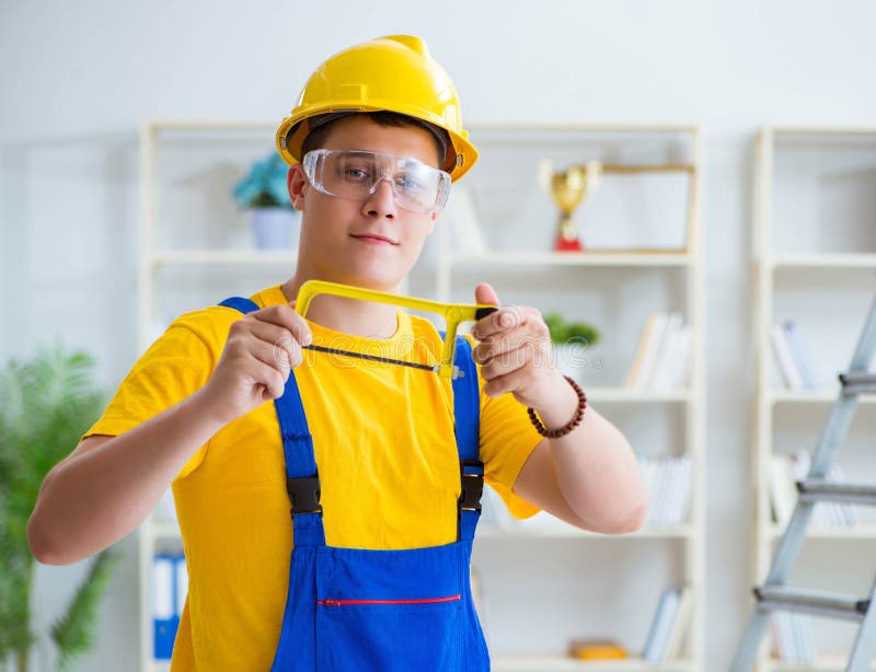 Young Contractor Doing Repair Works at Office Stock Image - Image of ...