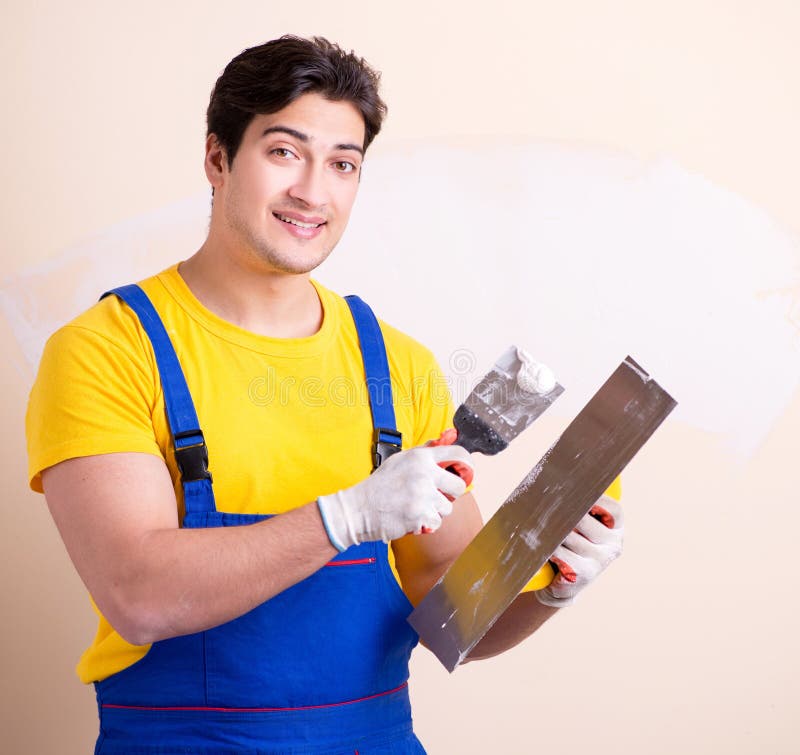 Young Contractor Employee Applying Plaster on Wall Stock Photo - Image ...