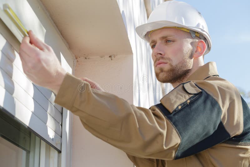 Two Workers Installing Window Stock Photo - Image of professional ...