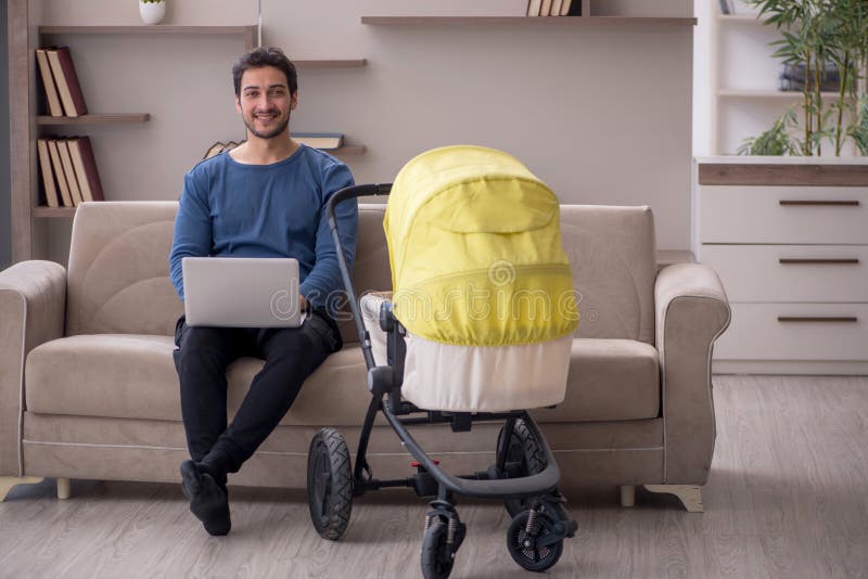 Young Male Contractor Looking after Baby at Home Stock Photo - Image of ...
