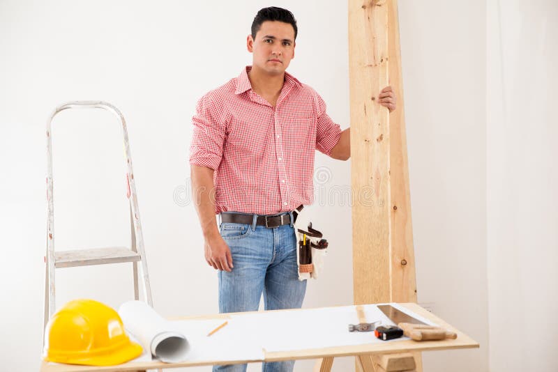 Young Contractor at Work at a House Stock Image - Image of copy ...