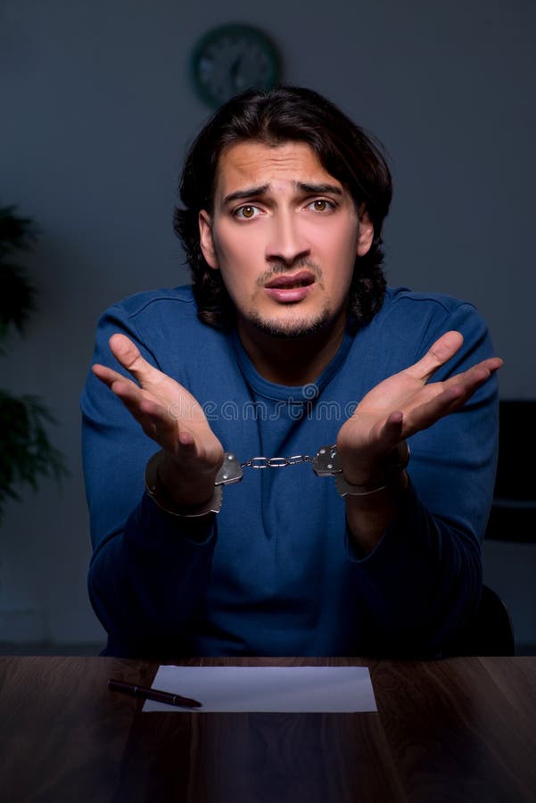 Young Convict Man Sitting in Dark Room Stock Image - Image of arrest ...