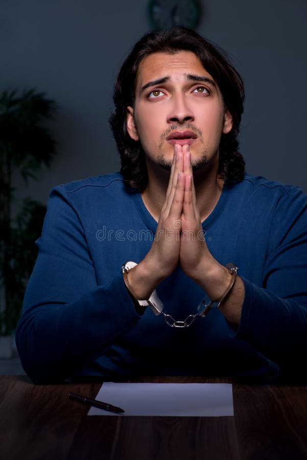 Young Convict Man Sitting in Dark Room Stock Image - Image of ...