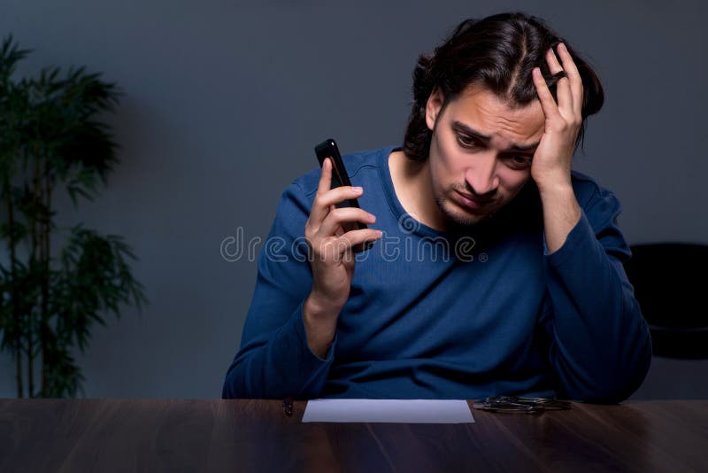 Young Convict Man Sitting in Dark Room Stock Image - Image of criminal ...