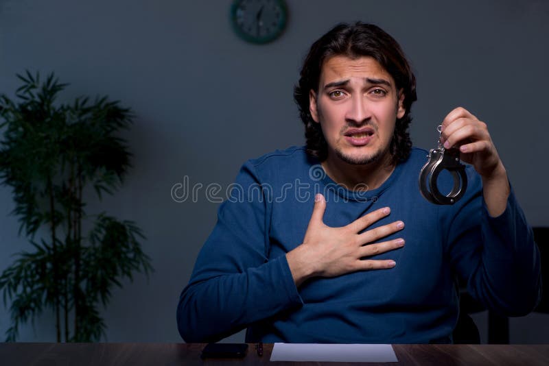 Young Convict Man Sitting in Dark Room Stock Image - Image of ...