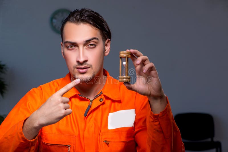 Young Convict Man Sitting in Dark Room Stock Image - Image of lock ...