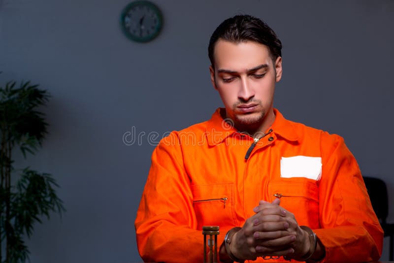 Young Convict Man Sitting in Dark Room Stock Image - Image of detaining ...