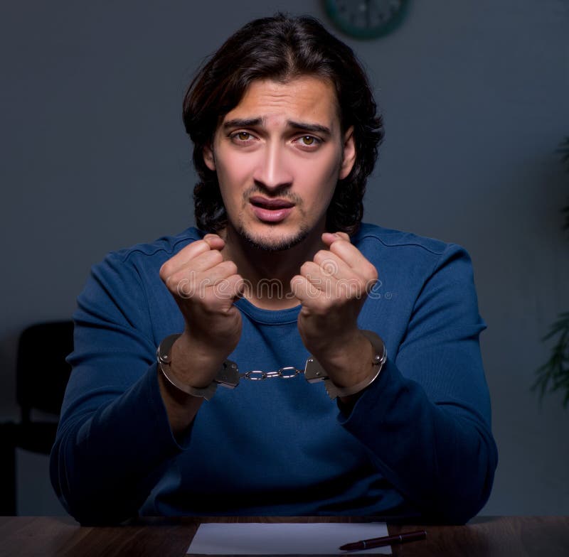 Young Convict Man Sitting in Dark Room Stock Image - Image of despaired ...