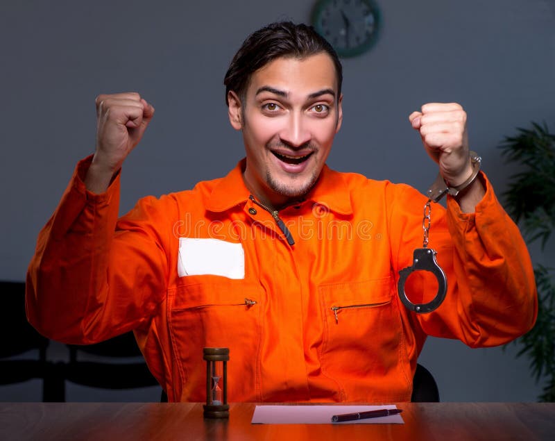 Young Convict Man Sitting in Dark Room Stock Image - Image of captivity ...