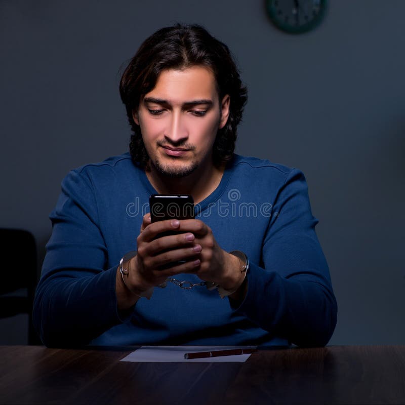 Young Convict Man Sitting in Dark Room Stock Image - Image of jail ...