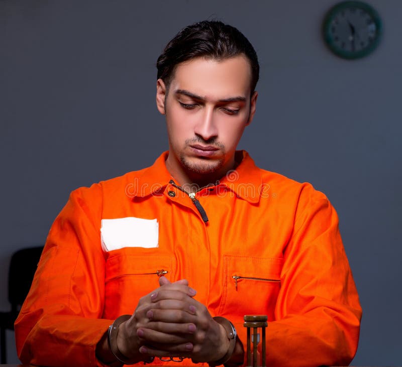 Young Convict Man Sitting in Dark Room Stock Photo - Image of hand ...