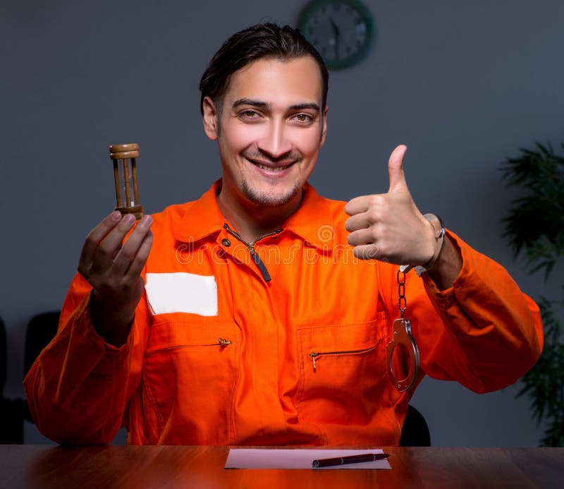 Young Convict Man Sitting in Dark Room Stock Image - Image of cuff ...