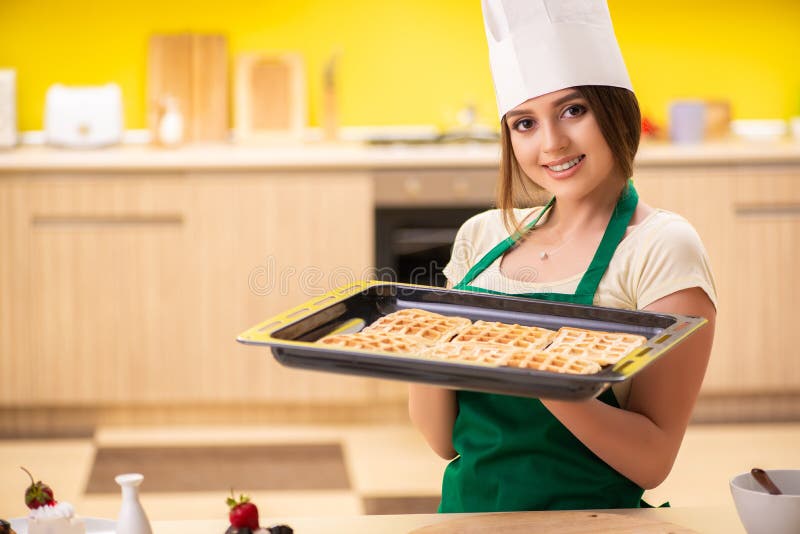 The Young Cook Cooking Cakes in the Kitchen Stock Photo - Image of ...