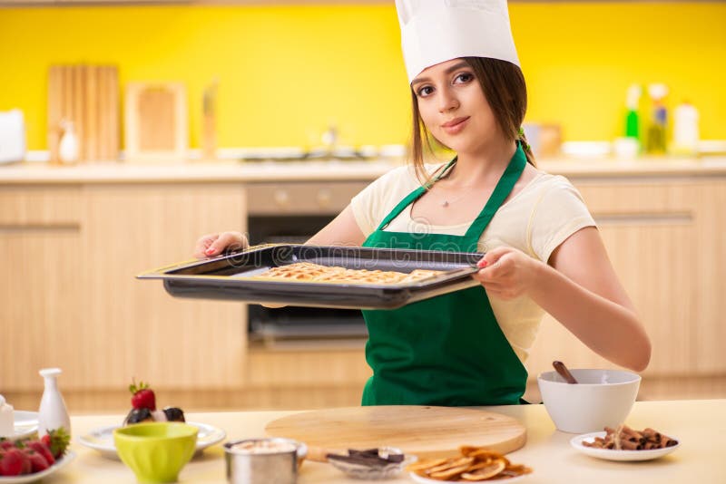 The Young Cook Cooking Cakes in the Kitchen Stock Photo - Image of ...