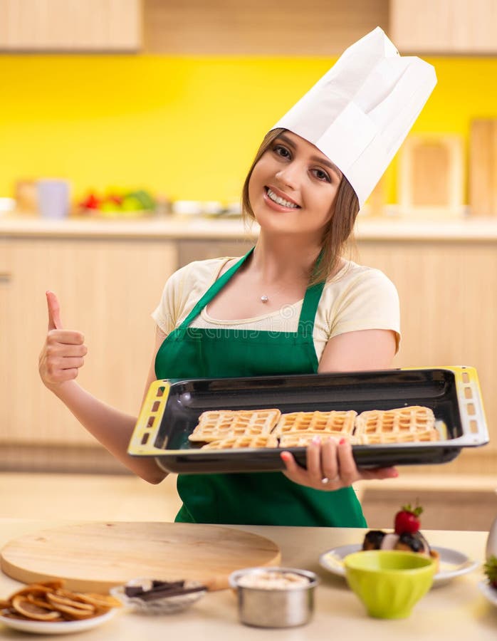 Young Cook Cooking Cakes in the Kitchen Stock Photo - Image of ...
