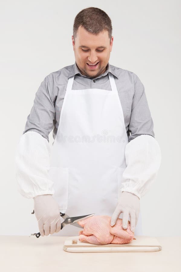 Young Cook Cutting Chicken in Half. Stock Image - Image of meat, happy ...
