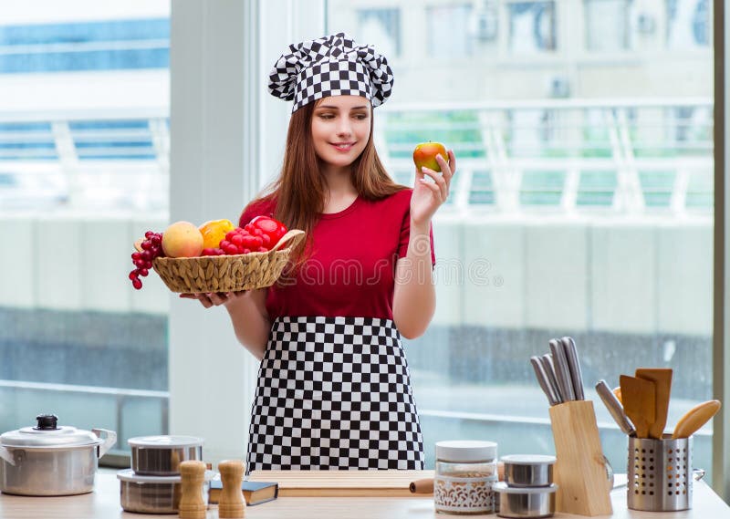 Young Cook with Fruits in the Kitchen Stock Photo - Image of apron ...