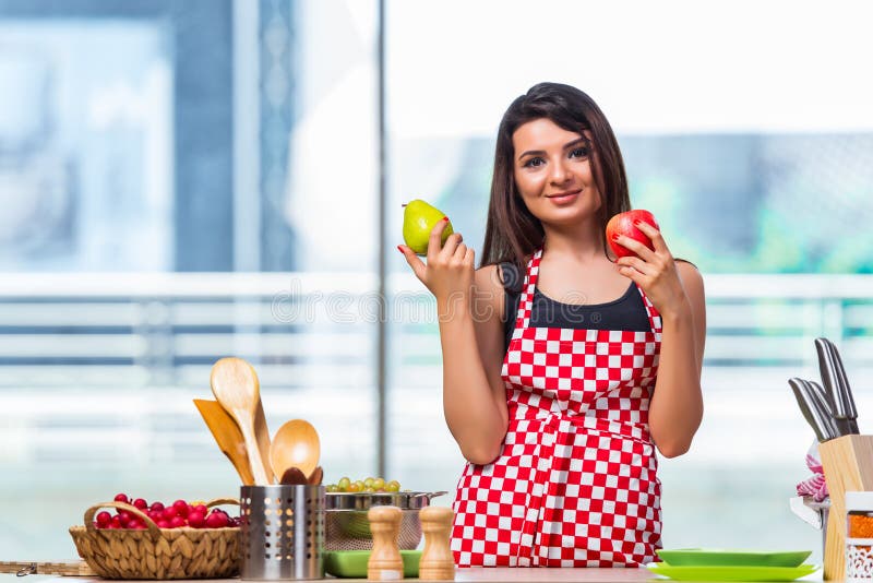The Young Cook with Fruits in the Kitchen Stock Photo - Image of ...