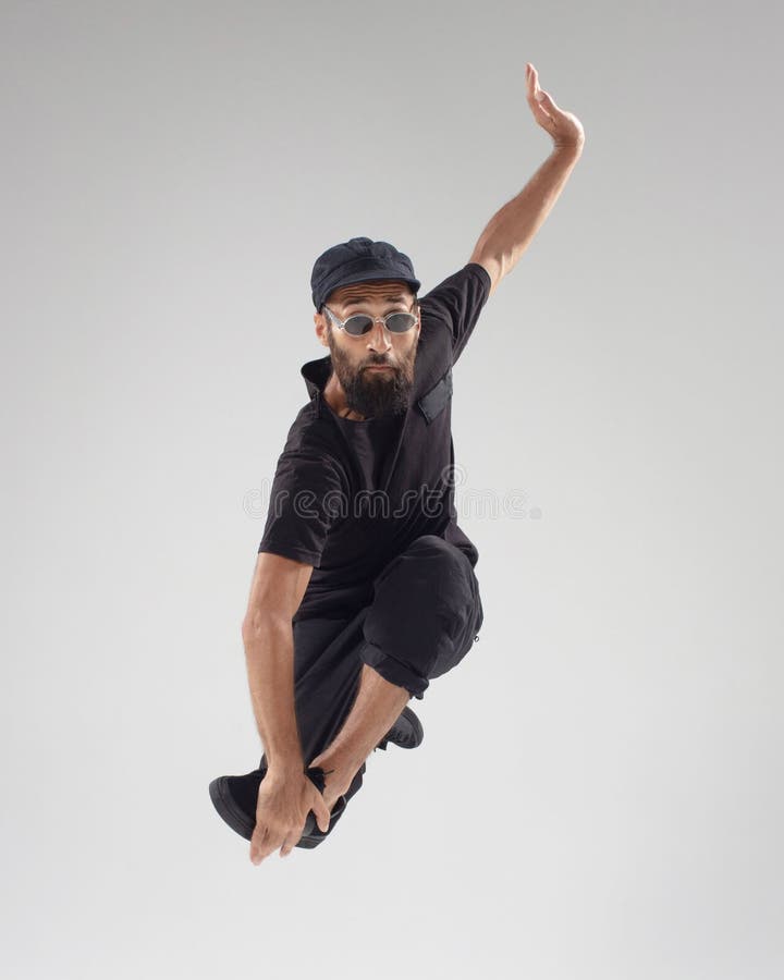 Hip Hop Dancer Moving and Jumping in Photostudio Stock Photo - Image of ...