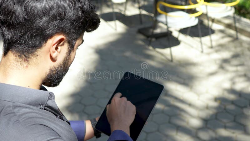 A Young Cool Man Keep Touching His Blank Screen Tablet Stock Footage ...