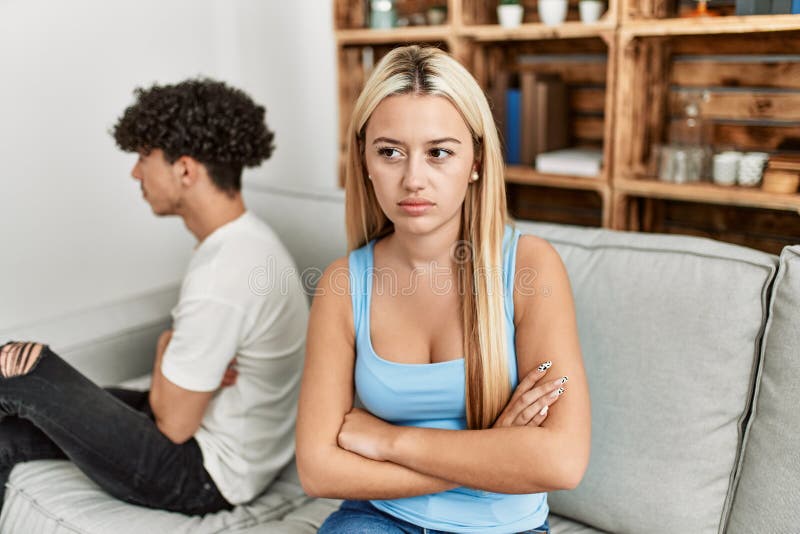 Young Couple Angry Sitting on the Sofa in Silence at Home Stock Photo ...