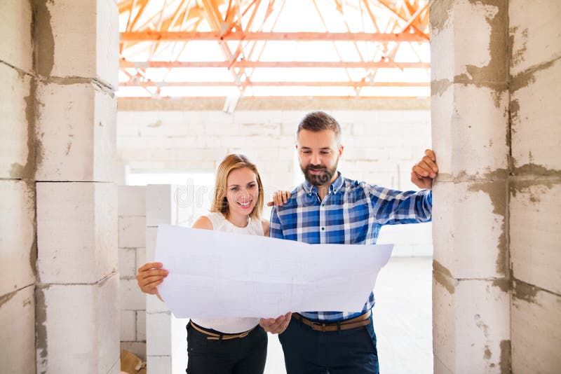 Architects and Civil Engineer at the Construction Site. Stock Image ...