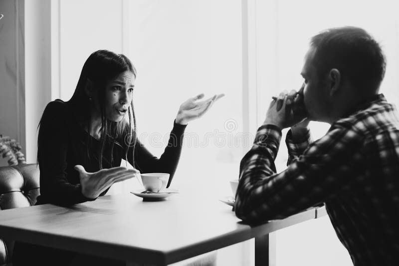 Young Couple Arguing in a Cafe. Relationship Problems. Stock Image ...